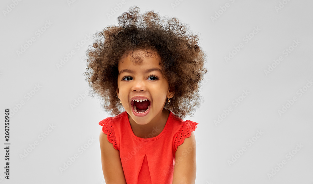 emotion, childhood and expression concept - happy laughing little ...