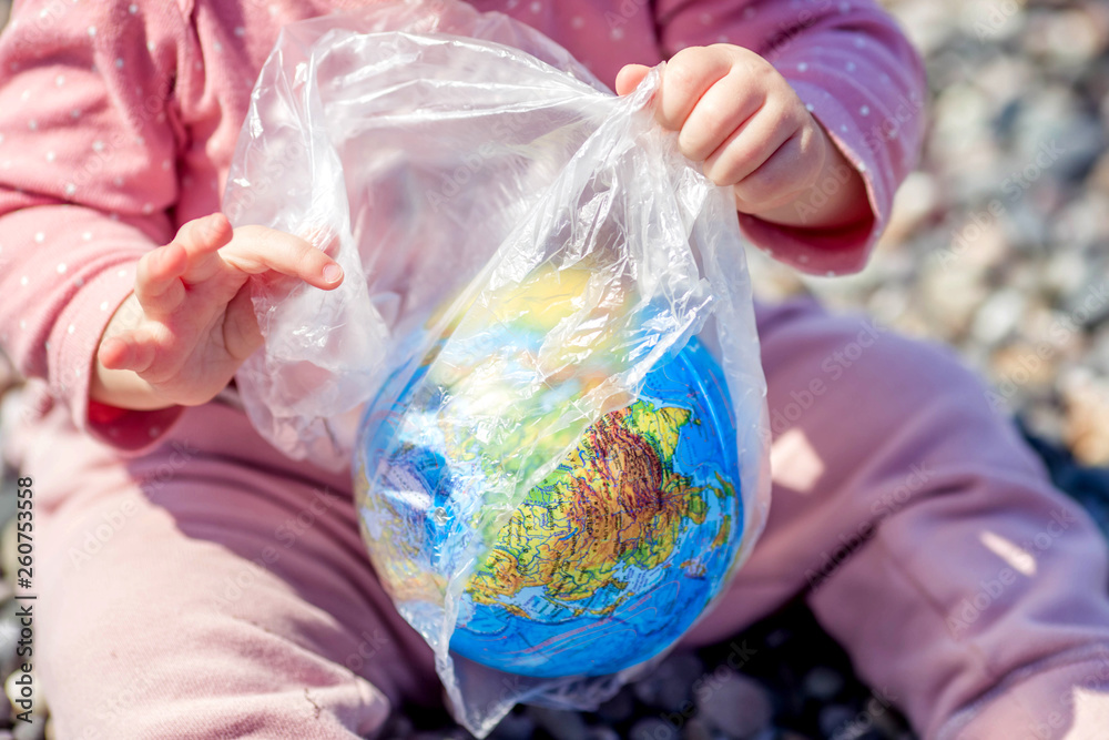 The Earth in a plastic bag. World Environment Day concept. Stock Photo ...