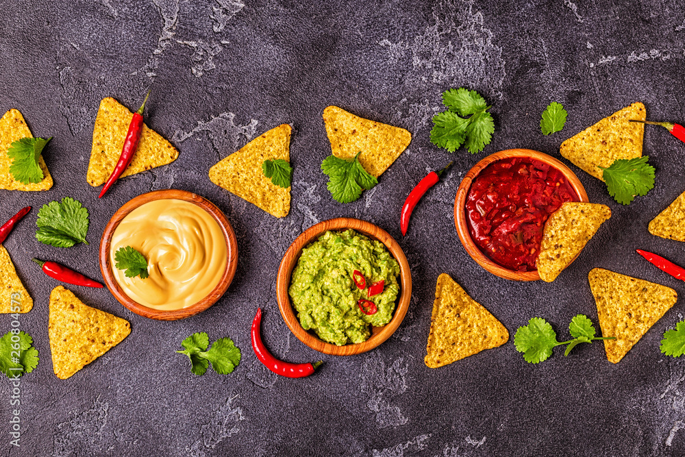 Mexican food background: guacamole, salsa, cheesy sauces Stock Photo ...