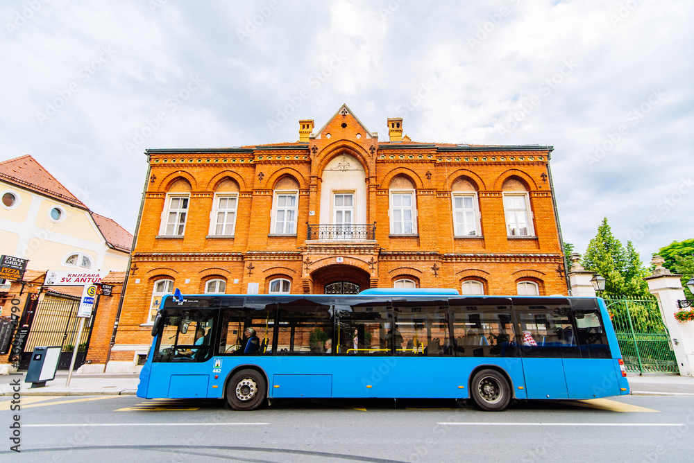 city bus station with blue bus Stock Photo | Adobe Stock
