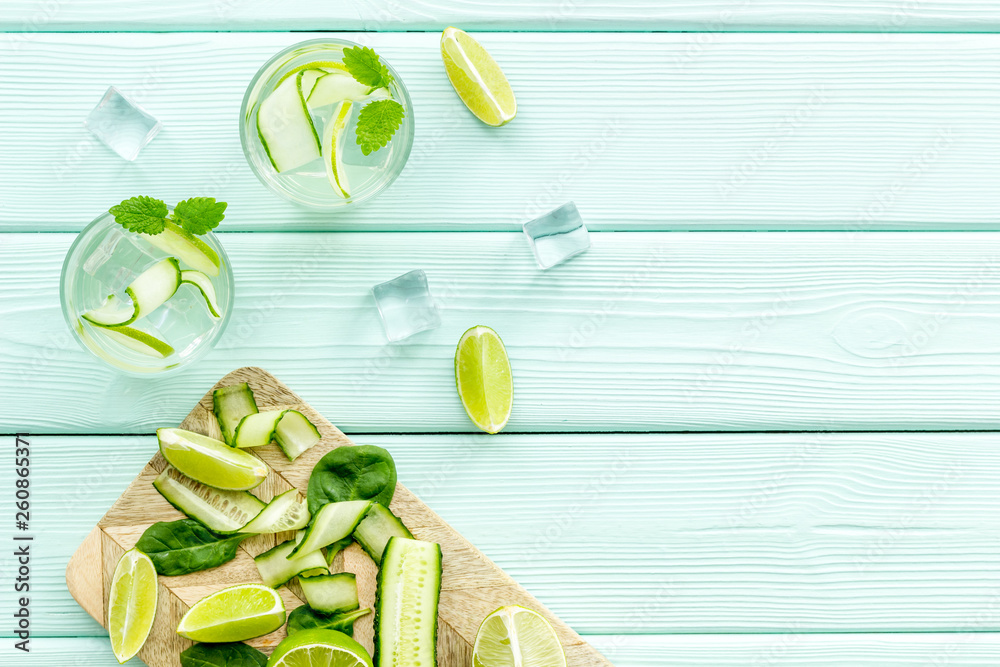 cold water with ice, spinach, cucumber and lime juice for summer ...