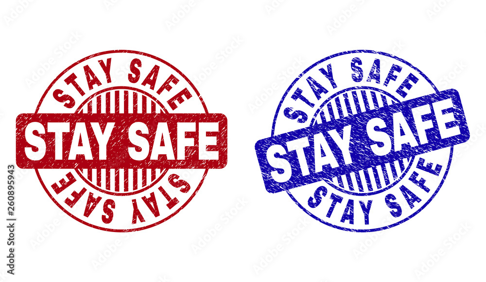 Grunge STAY SAFE round stamp seals isolated on a white background ...