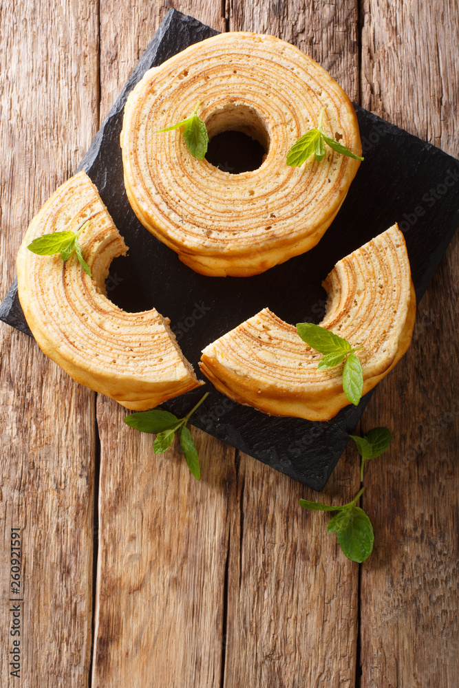 Baumkuchen, translated as tree cake, is a many-layered sponge cake ...