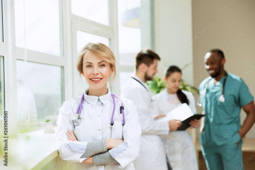 Healthcare people group. Professional female doctor posing at hospital ...