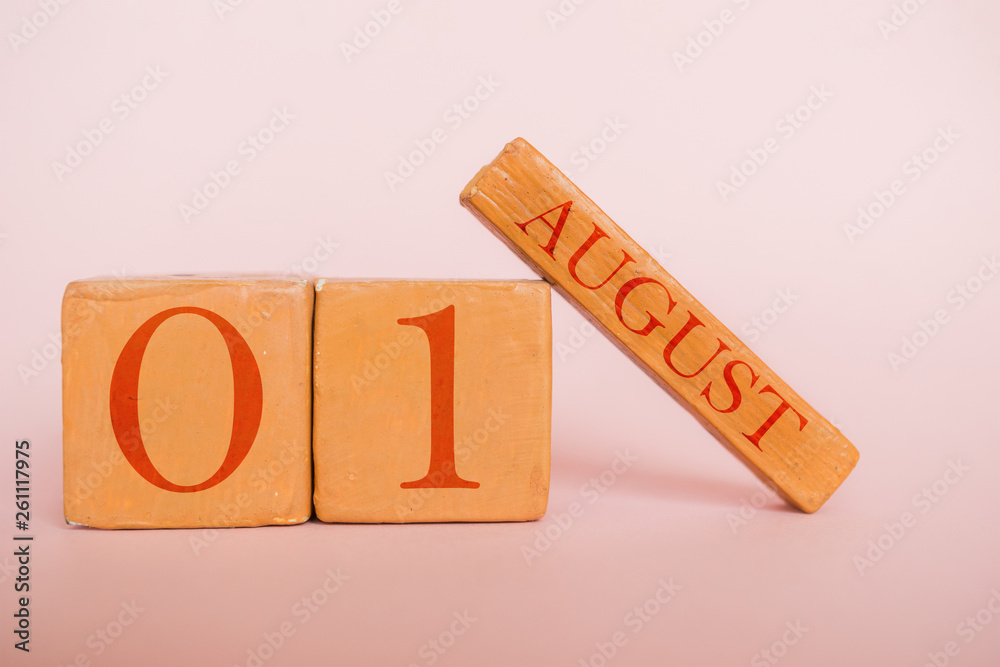 august 1st. Day 1 of month, handmade wood calendar on modern color ...