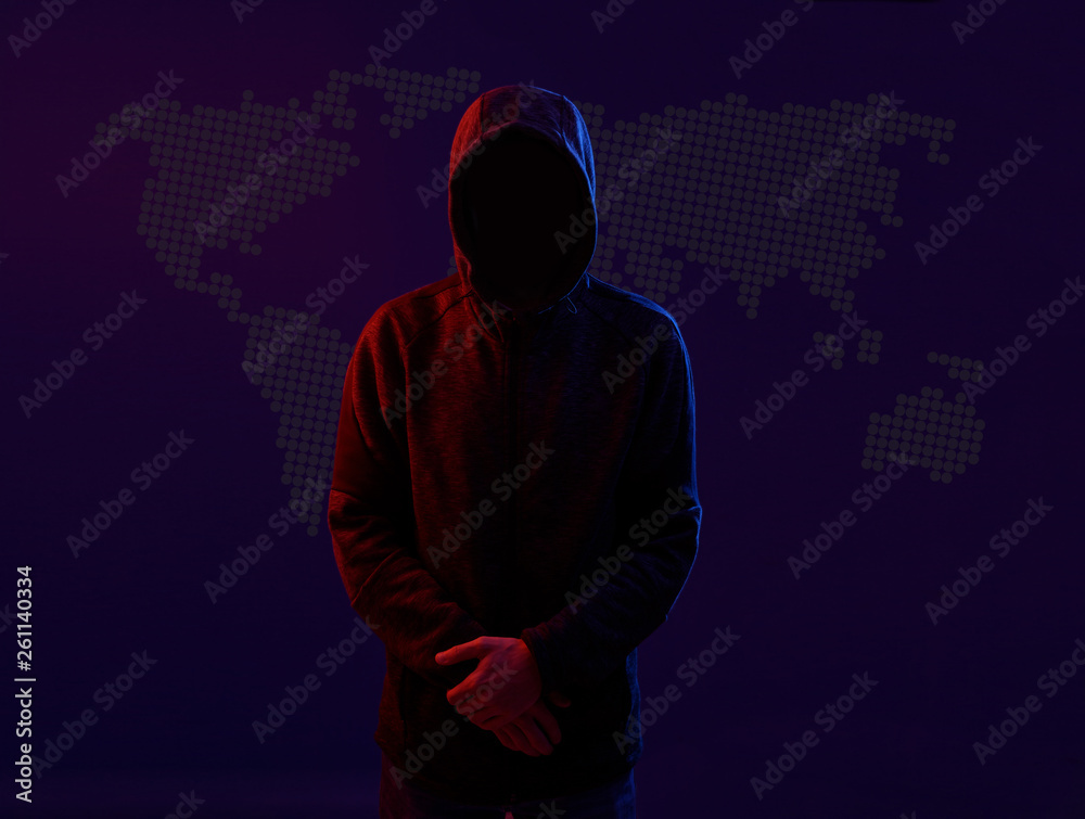 Dangerous hooded hacker. Internet, cyber crime, cyber attack, system breaking and malware ...