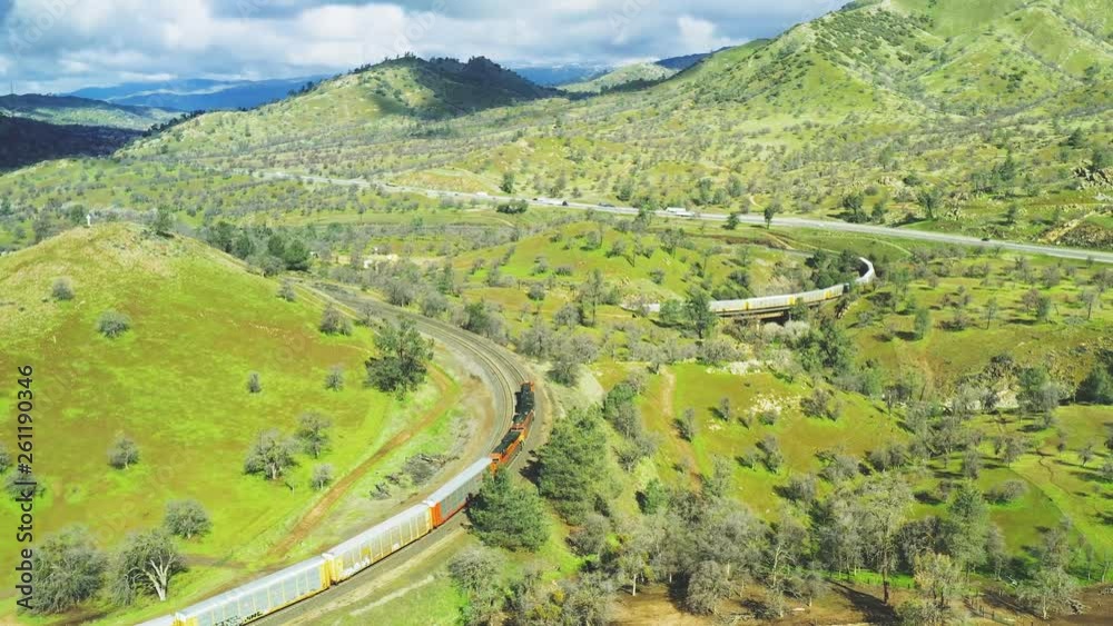 Vidéo Stock The aerial camera follows a 5000-foot-long freight train ...