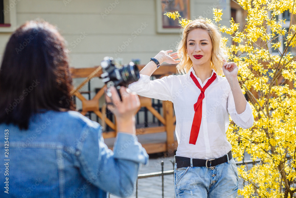 Blond woman model in white shirt red tie and lips having portrait photo ...