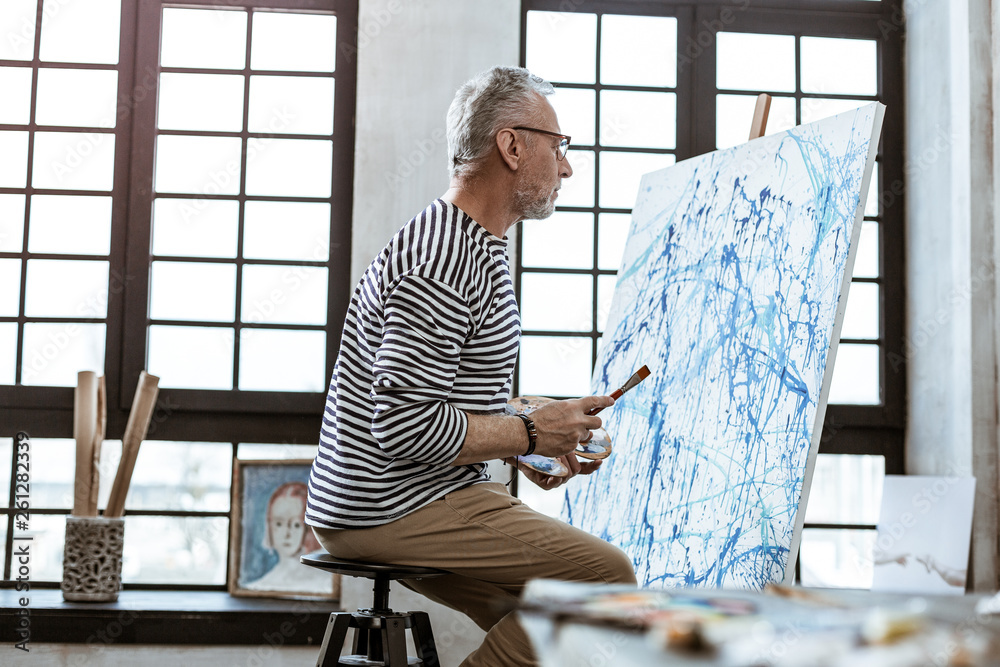 Famous modern artist using shades of blue in his new masterpiece Stock ...