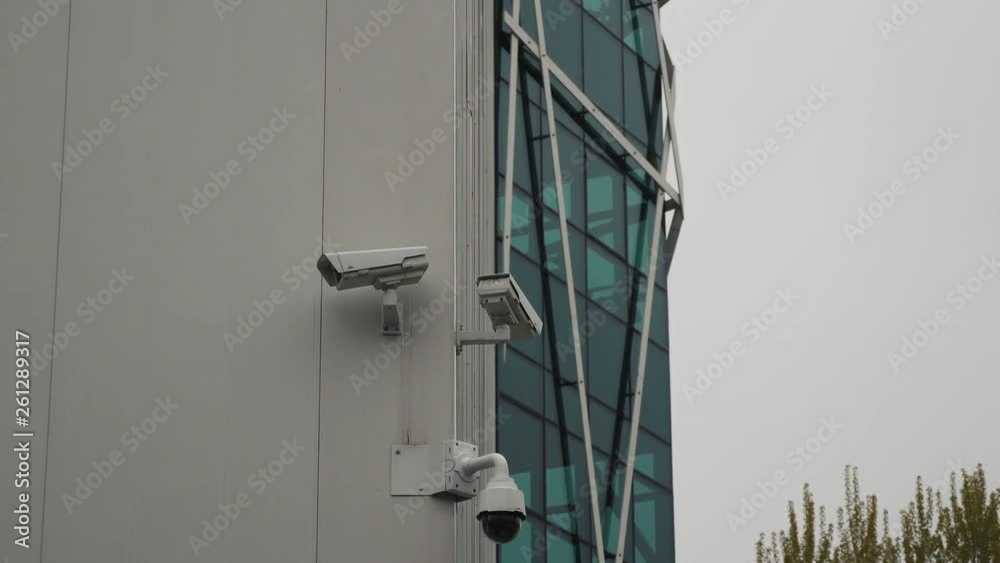 Outdoor video surveillance and security cameras installed on the modern ...