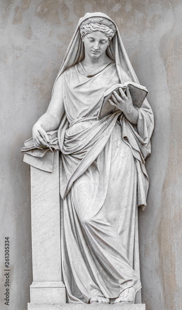 Ancient statue of sensual Italian Renaissance Era woman reading a book ...