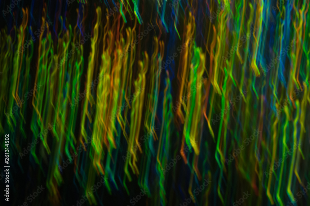 Blurry abstract background with wavy multicolor lines. Neon lights in ...