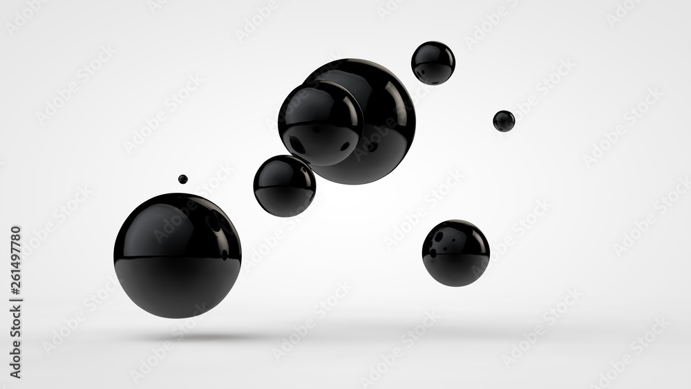 3D image of black balls in space. Balls of different sizes isolated on ...