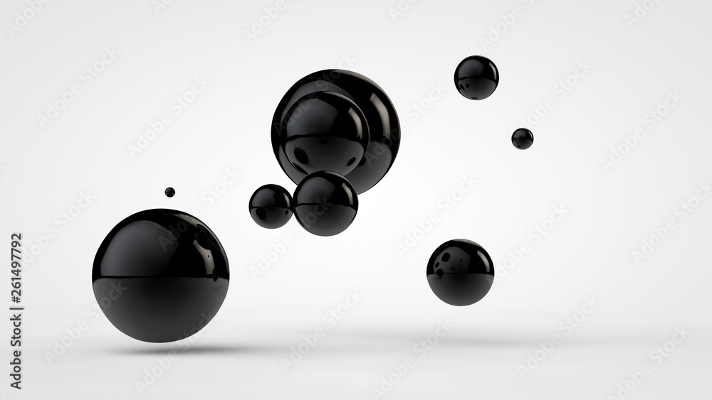 3D image of black balls in space. Balls of different sizes isolated on ...