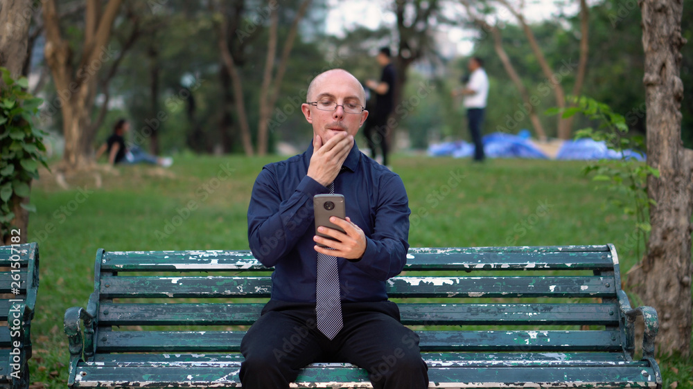Person Waiting On A Bench