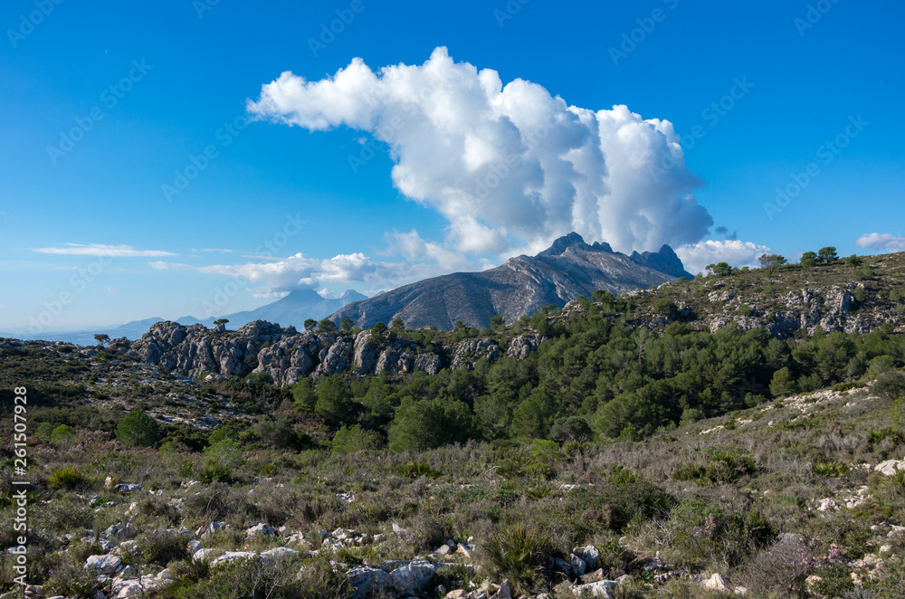 Serra de Bèrnia i Ferrer mountain range view form Serra d'Oltà. Calp ...