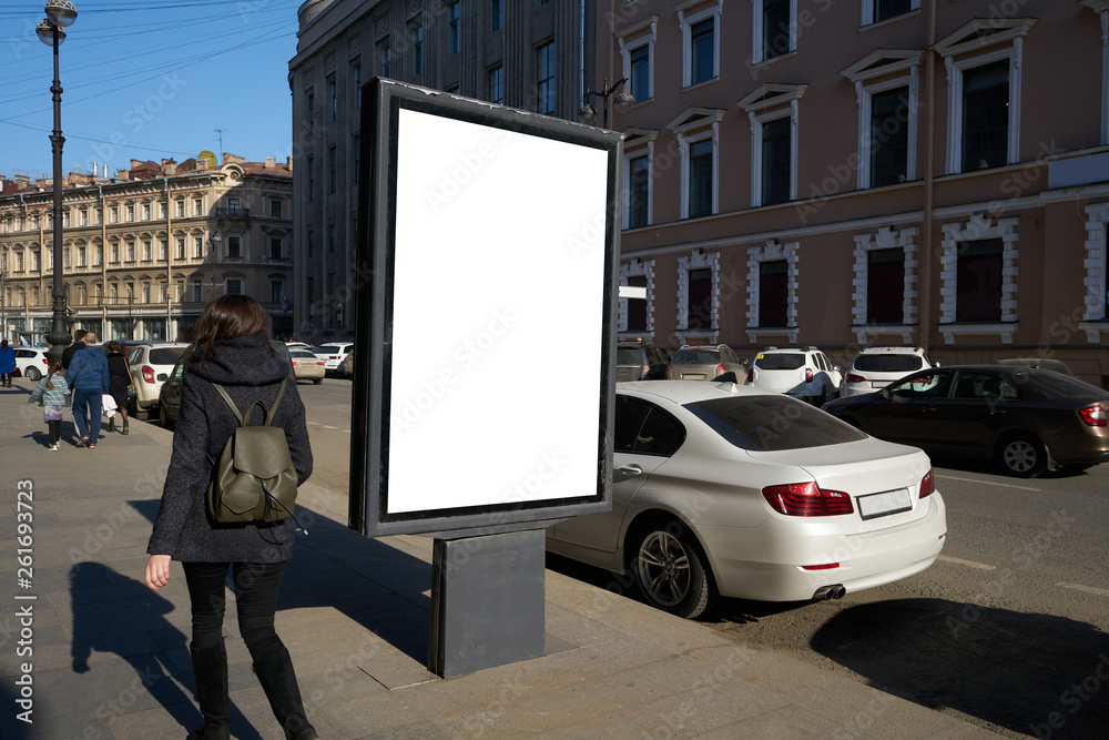 billboard small vertical city format in the city. with white mockup for ...