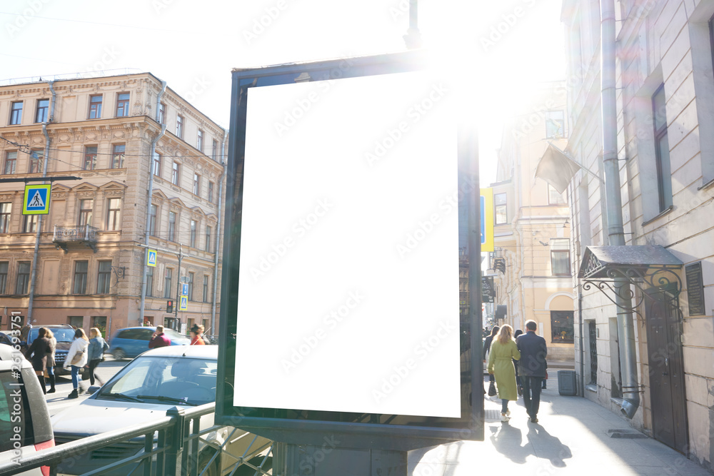 billboard small vertical city format in the city. with white mockup for ...