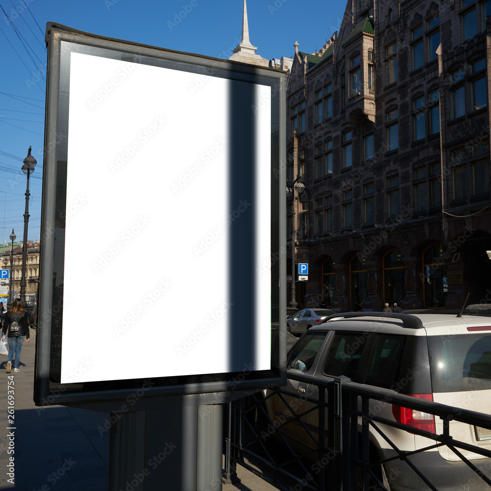 billboard small vertical city format in the city in the shadow of a ...