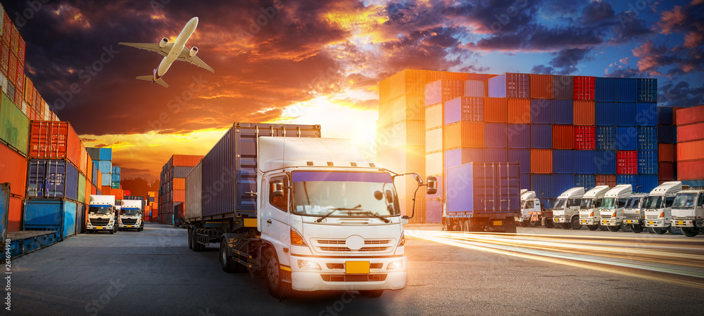 Container truck in ship port for business Logistics and transportation ...