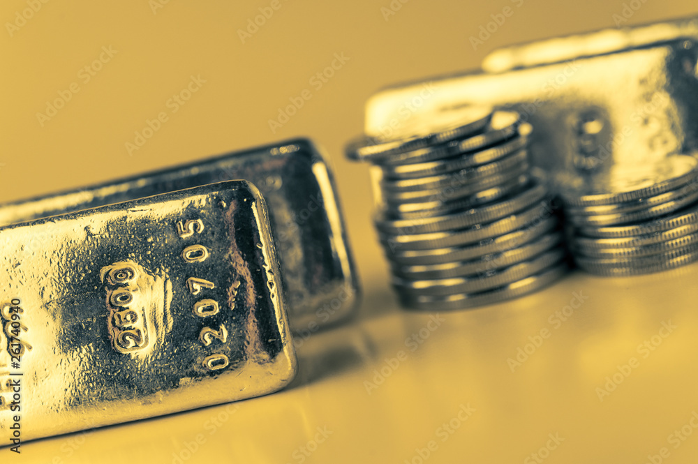 Gold bars and stack of gold coins. Background for finance banking ...