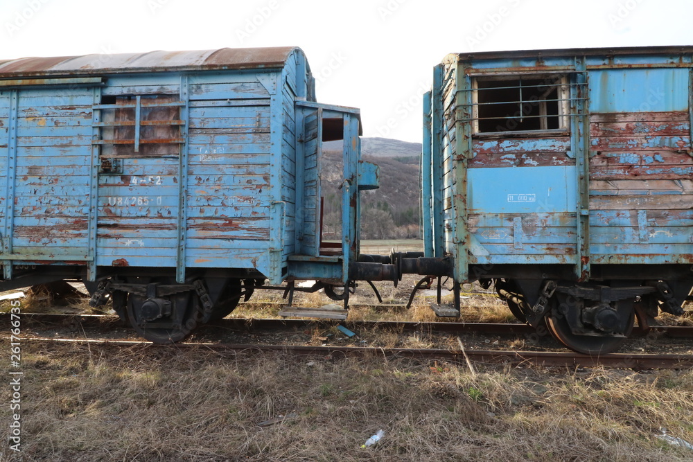 Abandoned old railway wagons at station, old train wagons in an ...