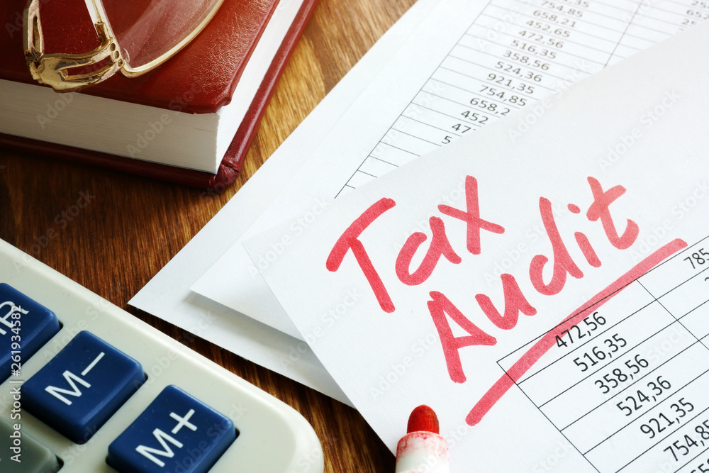 Tax audit handwriting on business accounting documents. Stock Photo ...