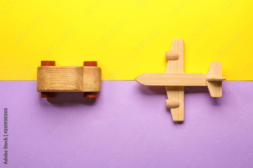 Toy airplane and car on color background. Travel concept Stock Photo ...