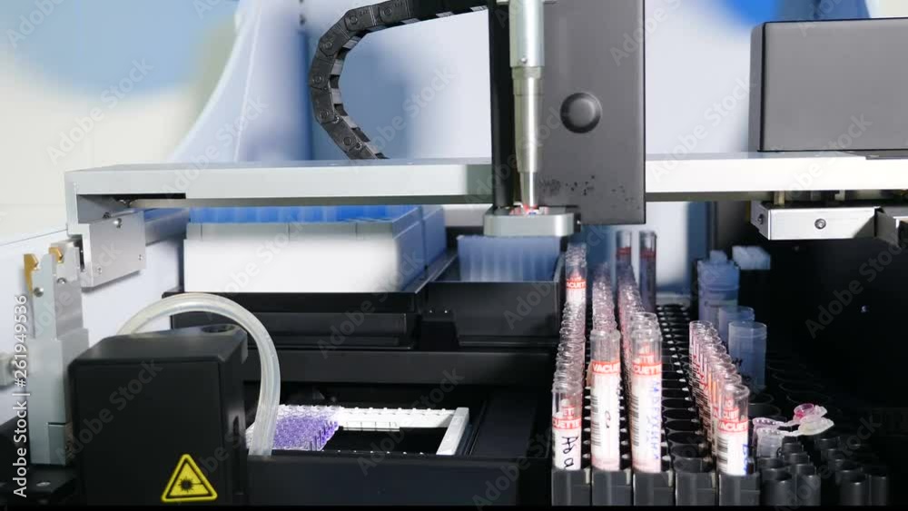 Laboratory analysis and diagnostic machine. Robotic manipulator arms ...