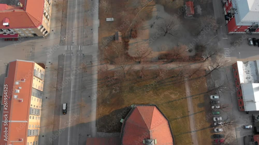 Reverse tilting drone footage of the beautiful Klosters church with it ...