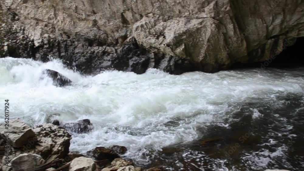 River disappears into a cave. Subterranean river. River enters the ...