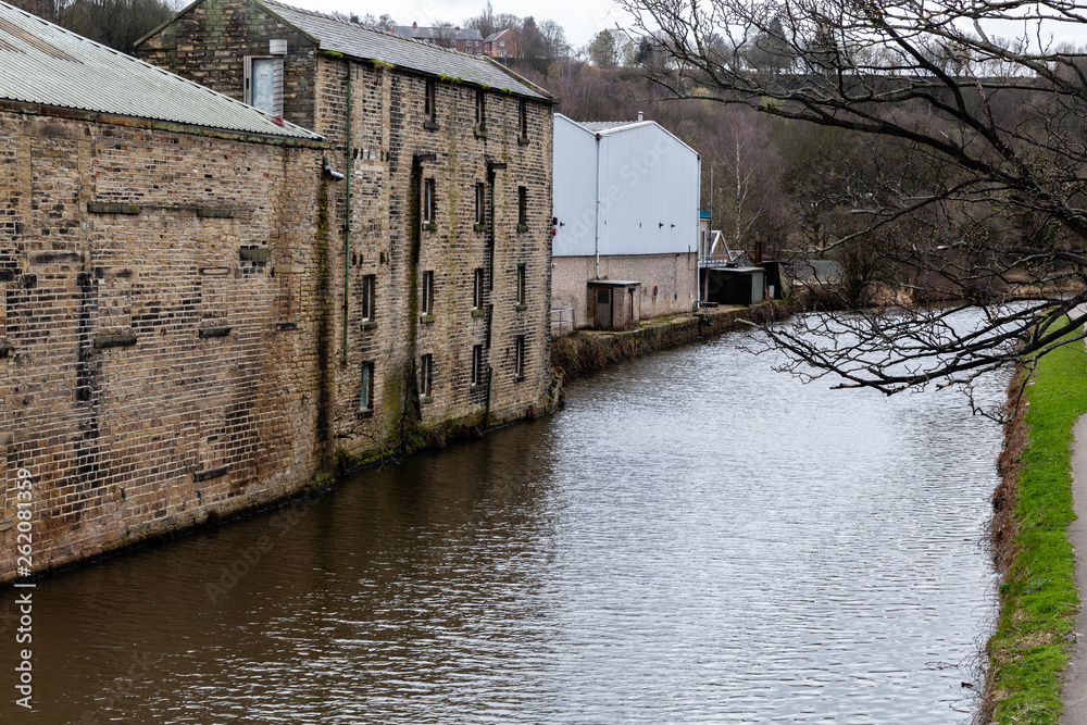 Old mill by a canal. Stock Photo | Adobe Stock