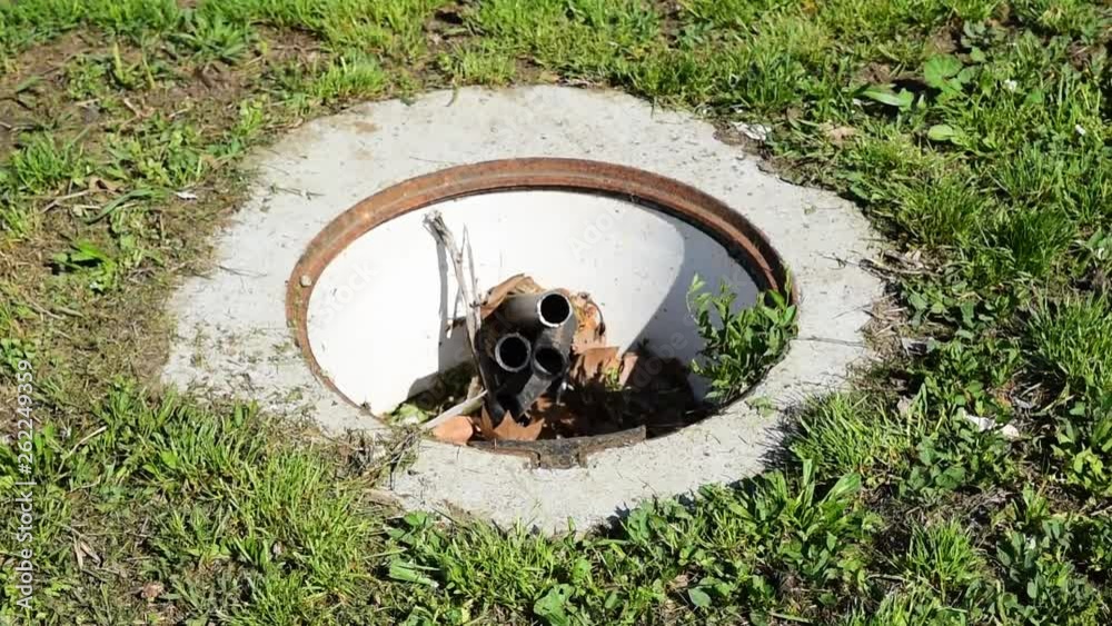 Dangerous opened manhole hole cover, danger for people who walking on ...