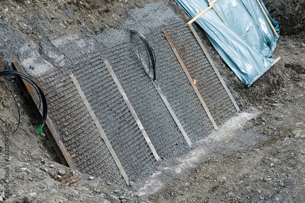 slab concrete and rebar iron for slope reinforcement at an excavation ...