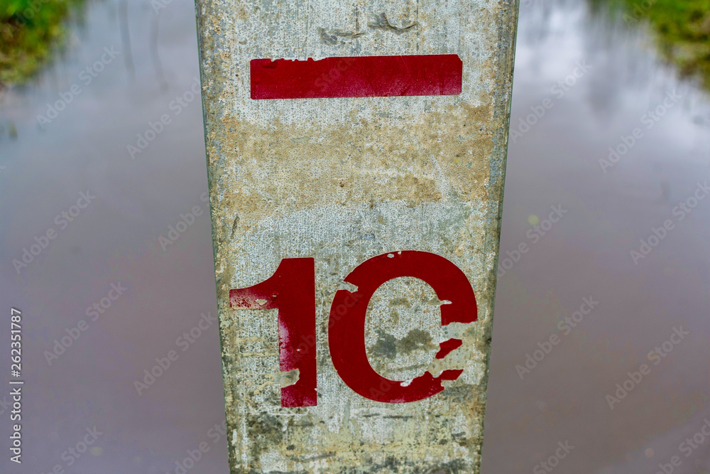 Water level gauge indicator monitor the flood water in dam, lake on ...