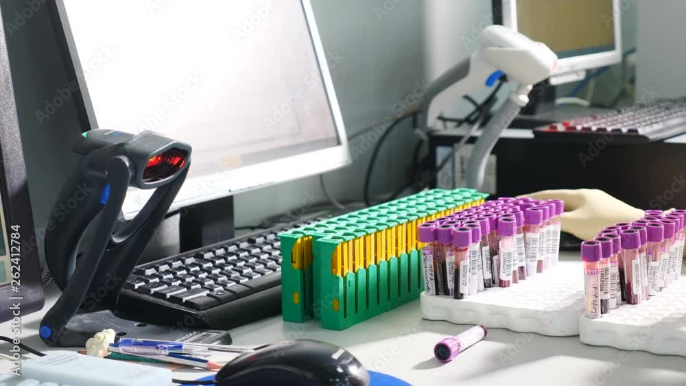 Laboratory analysis and diagnostic machine. Robotic manipulator arms ...