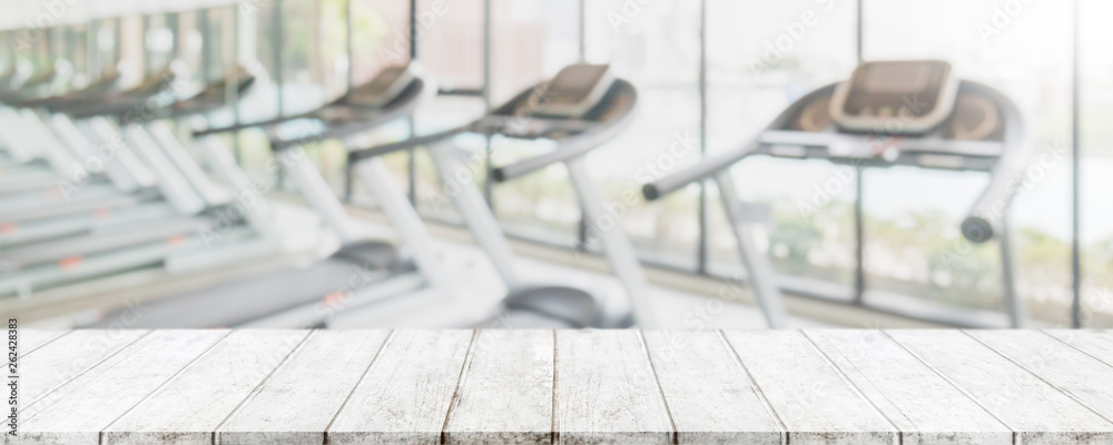 Empty wood table top on blurred with bokeh Exercise room,fitnees and ...