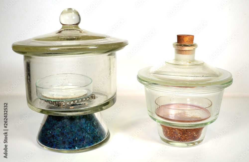 Two desiccators with preparates to be dried. The substance at the ...