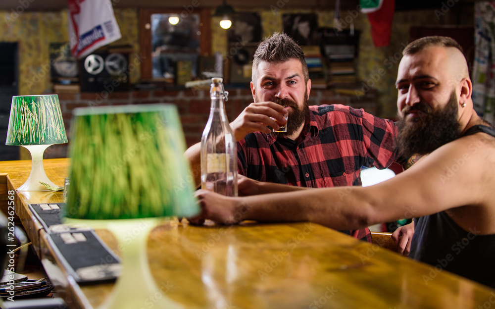 Men drunk relaxing at pub having fun. Hipster brutal man drinking ...