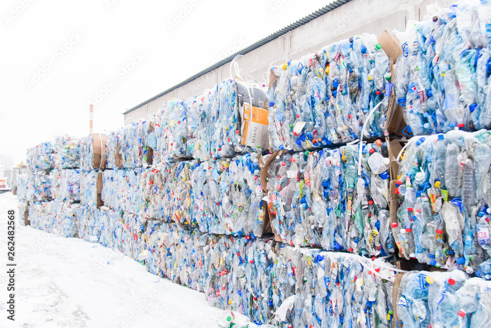 Plastic bales of rubbish at the waste treatment processing plant ...