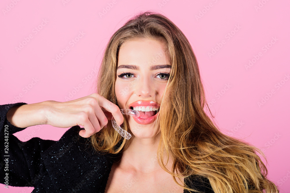 Foto de Teeth retainer for improving bite. Teeth care. Sensative woman ...