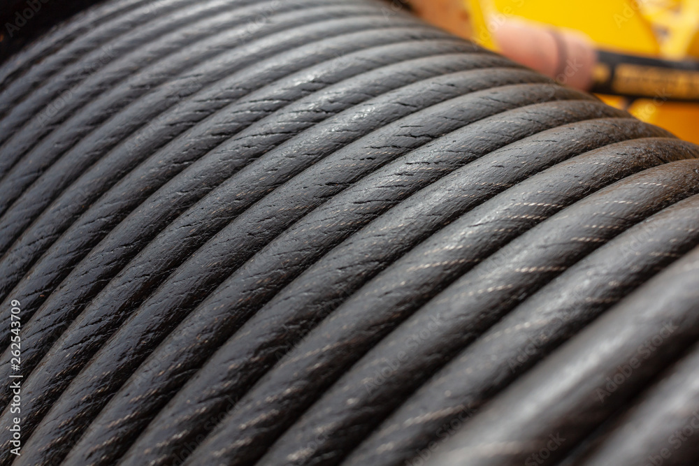 Wire rope sling or cable sling on crane reel drum or winch roll of ...