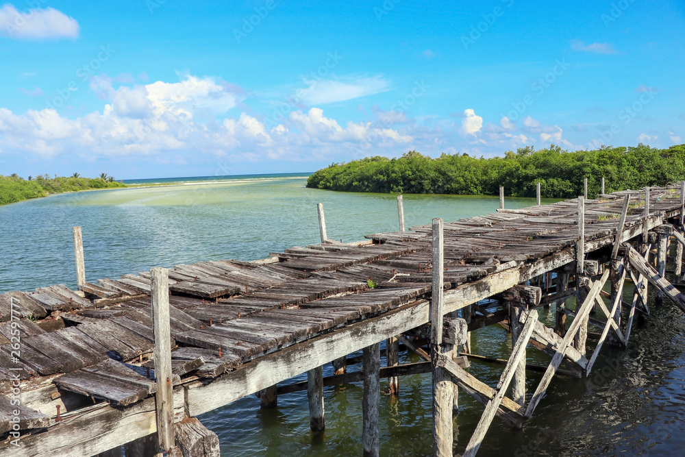 Old tropical destroyed wooden bridge in Sian Kaan Tulum Mexico. Mayan ...