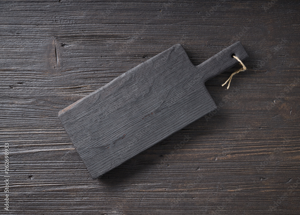 black wood cutting board Stock Photo | Adobe Stock