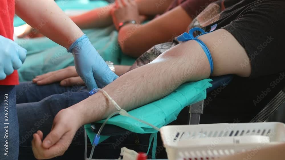 Blood Donation, Nurse receiving blood from blood donor in hospital ...