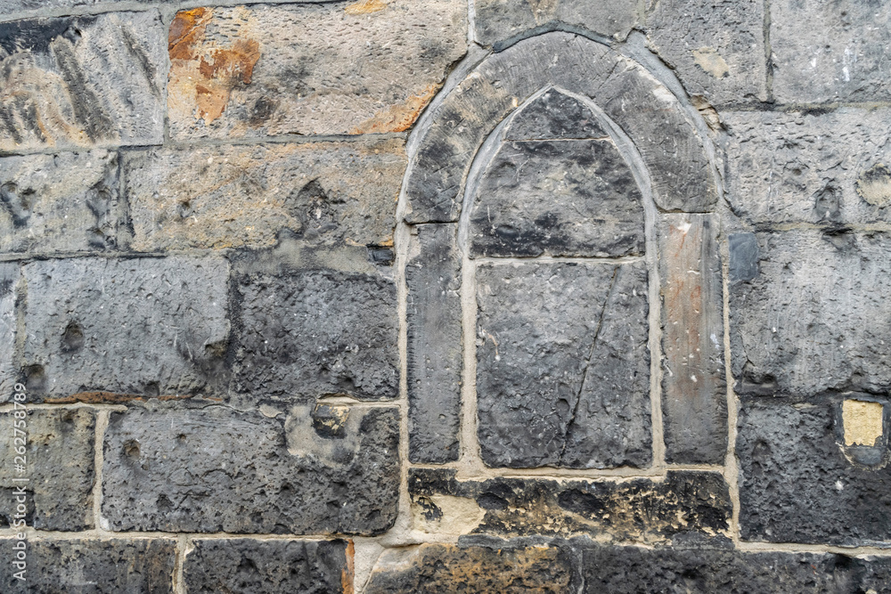 Medieval castle or fortress close-up. Part of the wall of an old stone ...