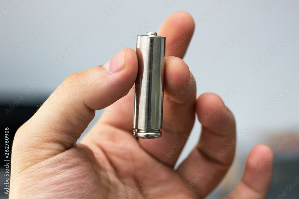 Battery in person in hands. Disposal of batteries and their recycling ...