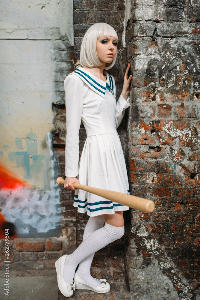 Anime girl with baseball bat in abandoned factory Stock Photo | Adobe Stock