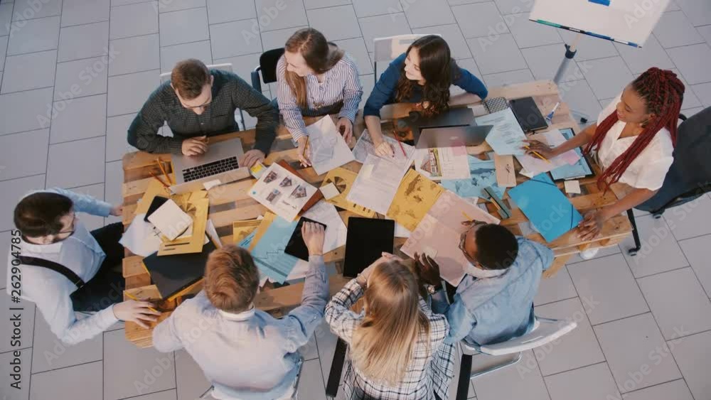 Young international law firm colleagues work together at modern office ...