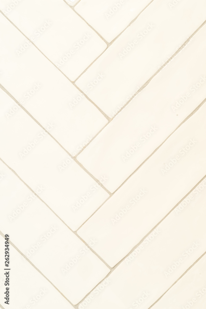 White tile herringbone pattern with gray grout for master bathroom ...
